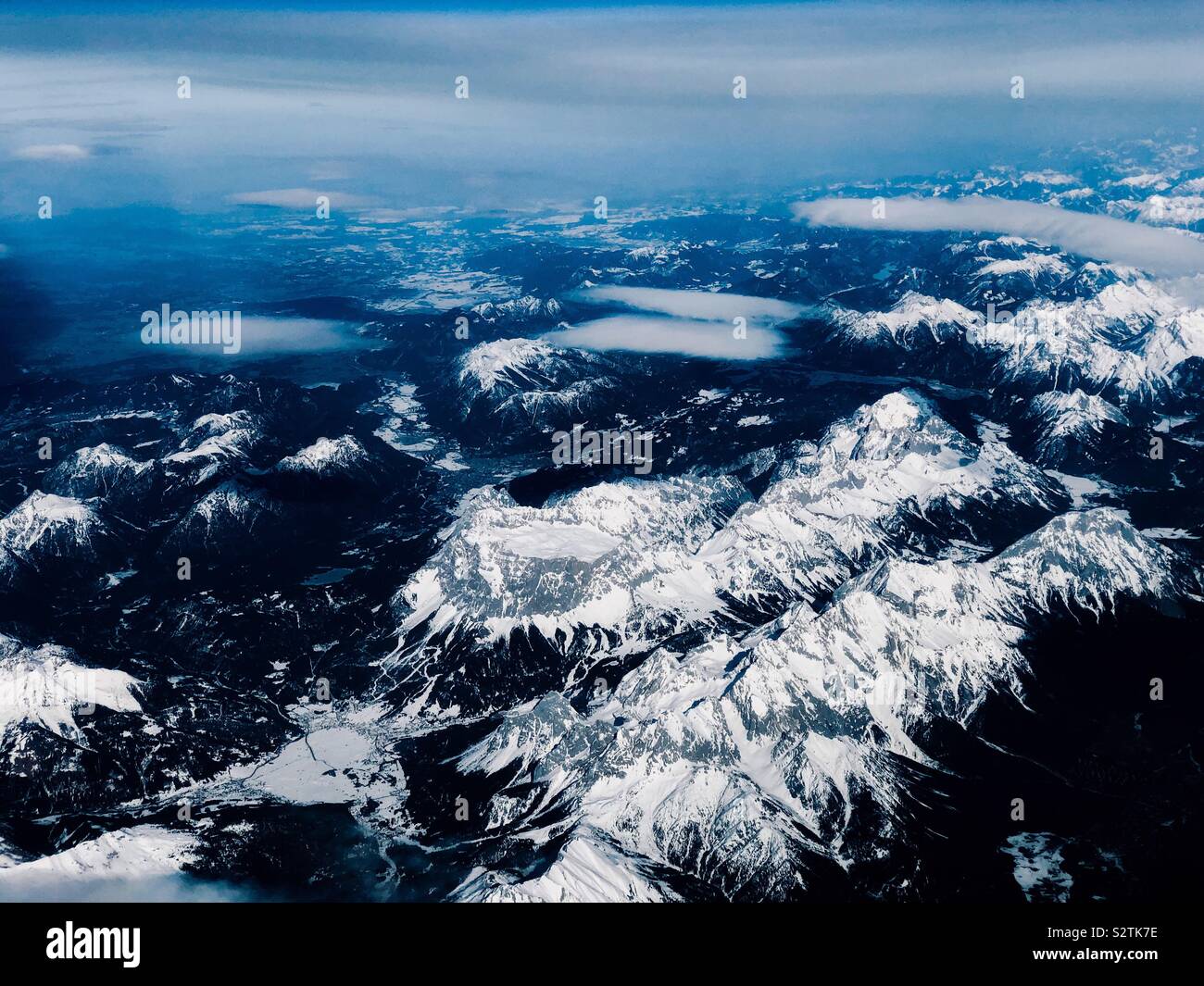 Aerial view of snow on Alps Stock Photo - Alamy