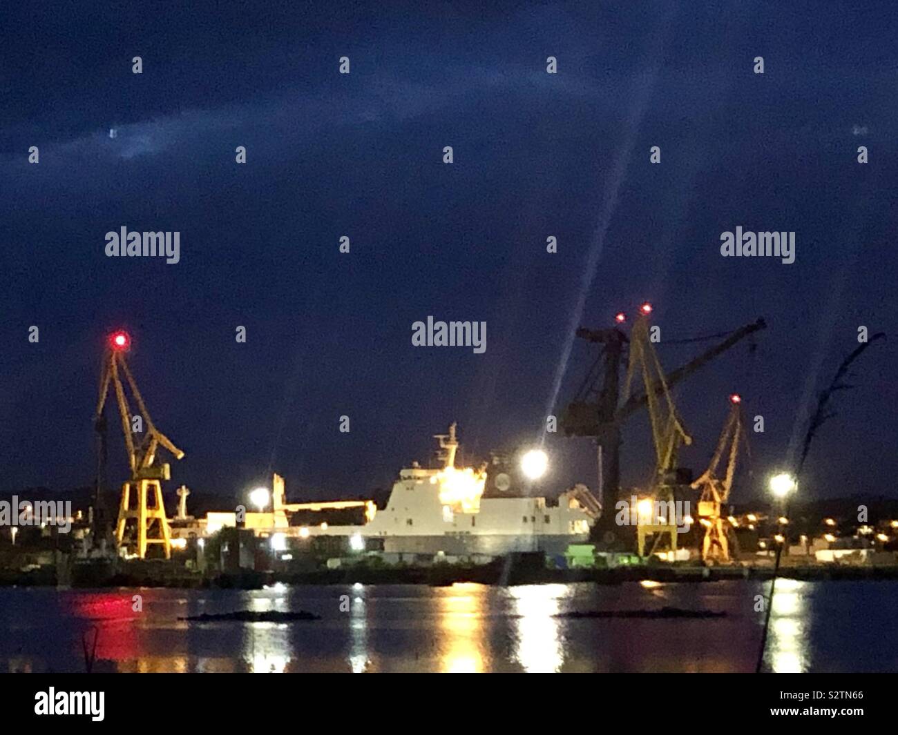 Shipyard at night Stock Photo - Alamy