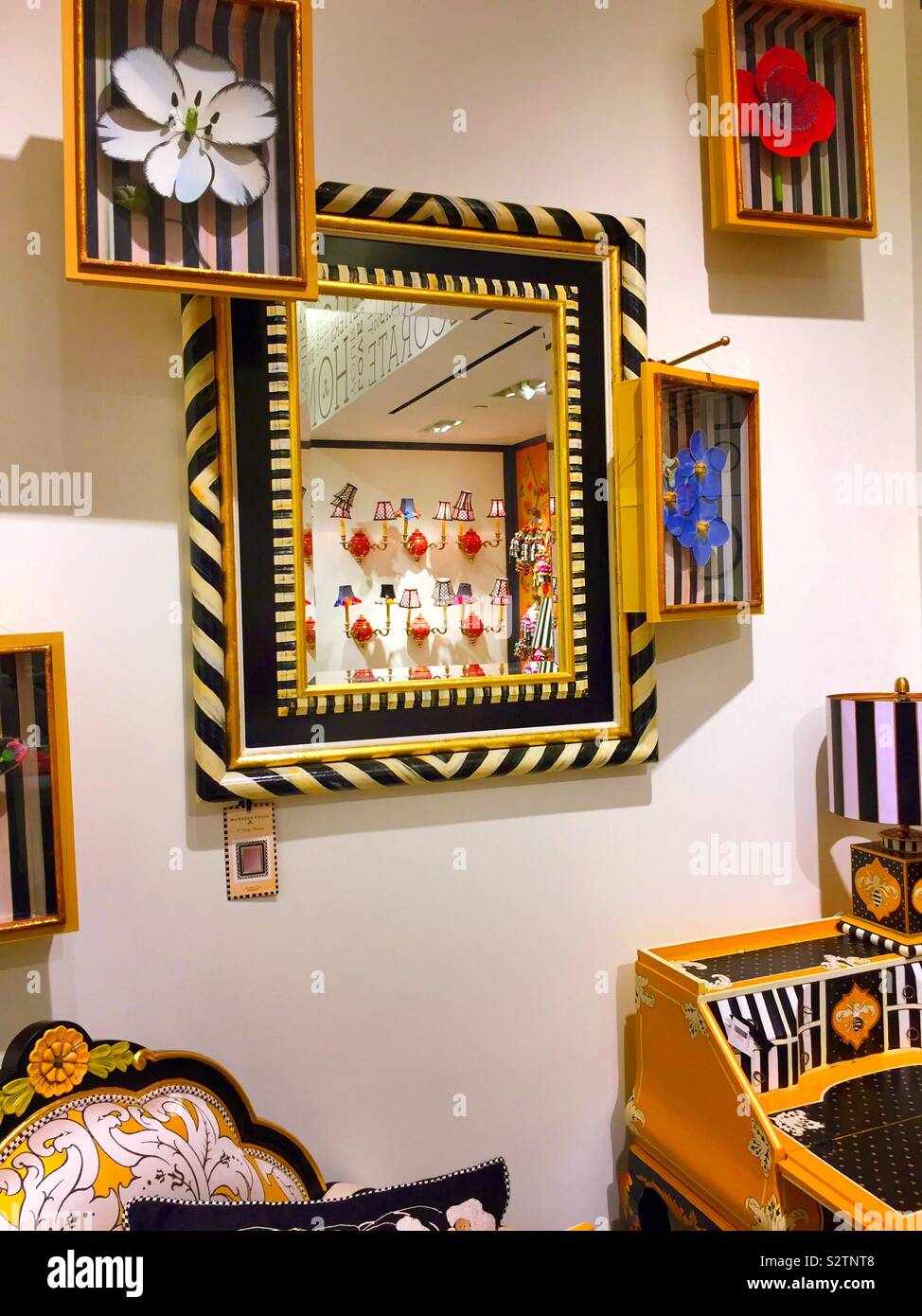 Decorative colored mirrors and picture frames in Mackenzie Childs, Soho ...