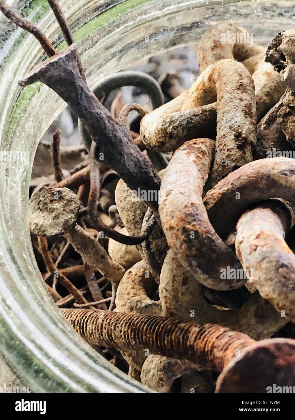 Nails in a jar Stock Photo - Alamy