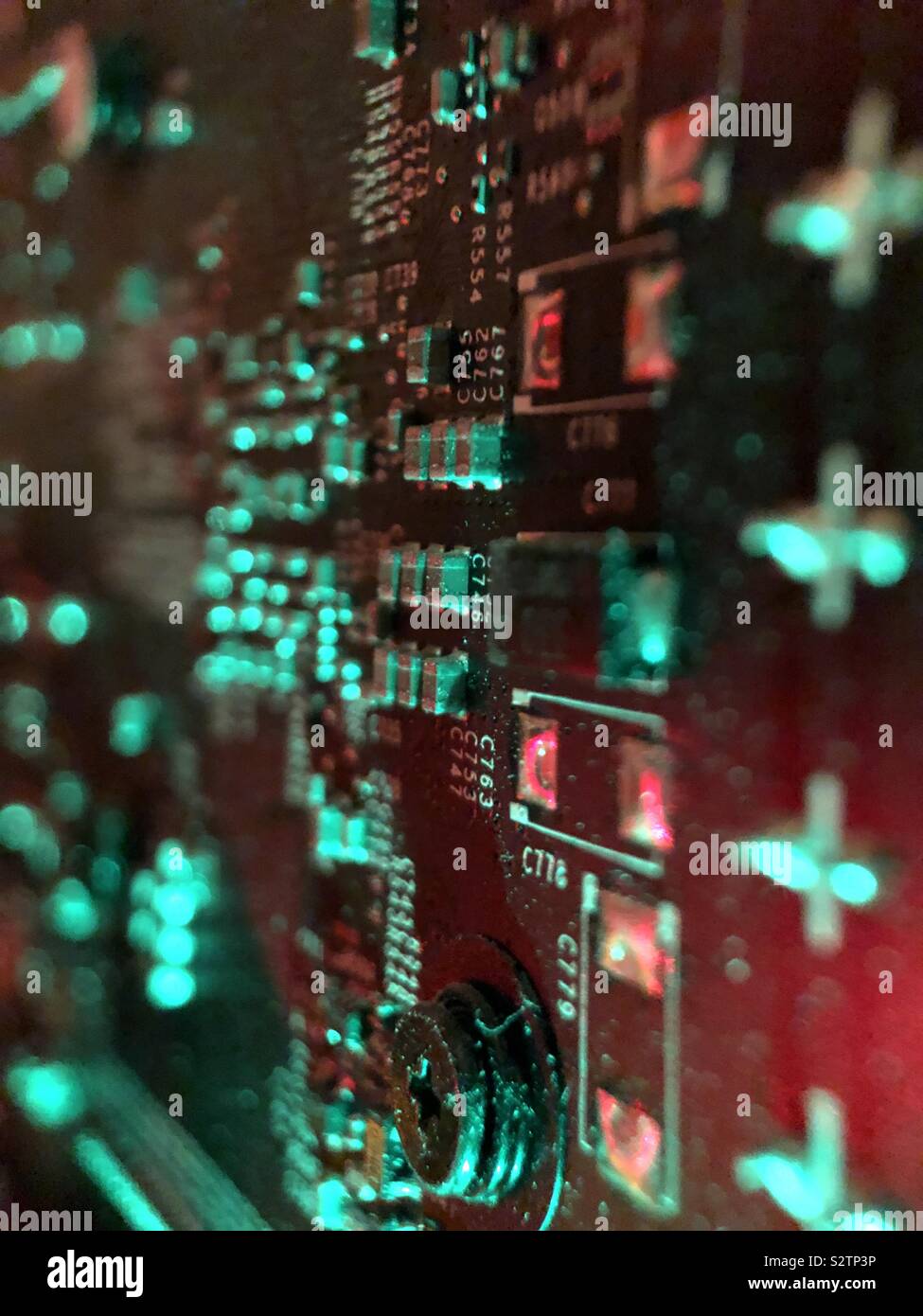 A close up view of all the soldering and attachments on the back of a ...