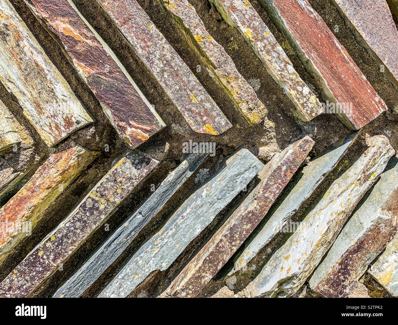 Schist stone wall close up Stock Photo - Alamy