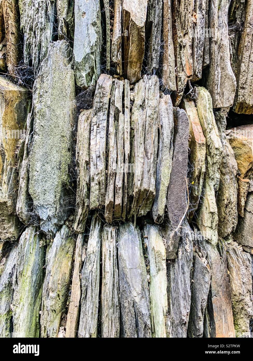 Schist stone wall Stock Photo - Alamy