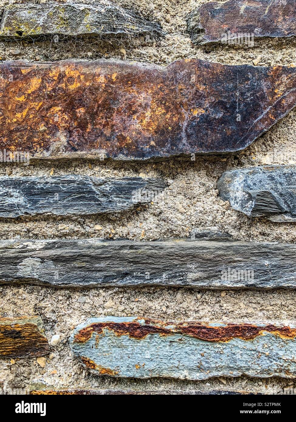 Schist stone wall Stock Photo - Alamy