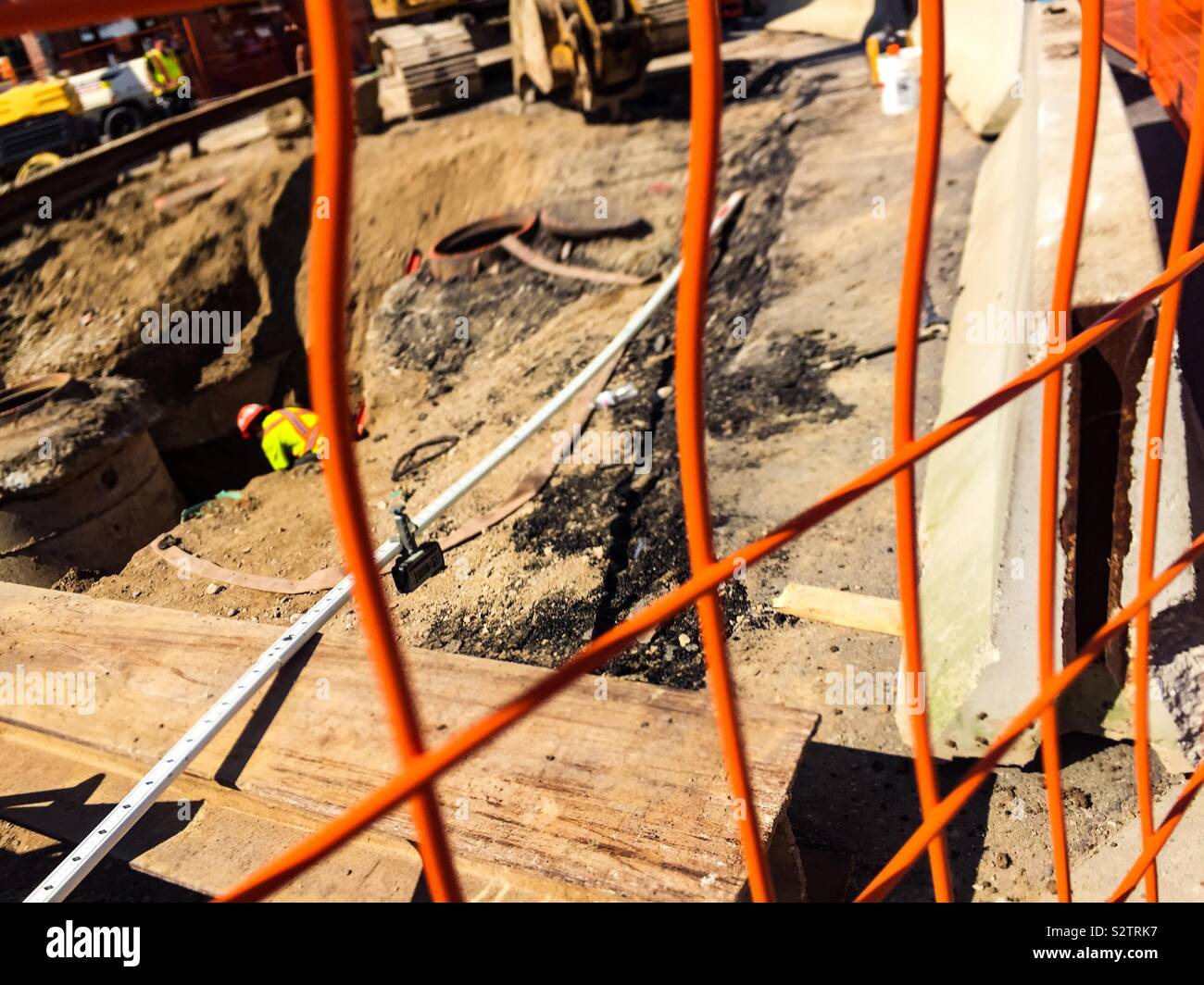 Deep Hole in road repair Stock Photo - Alamy