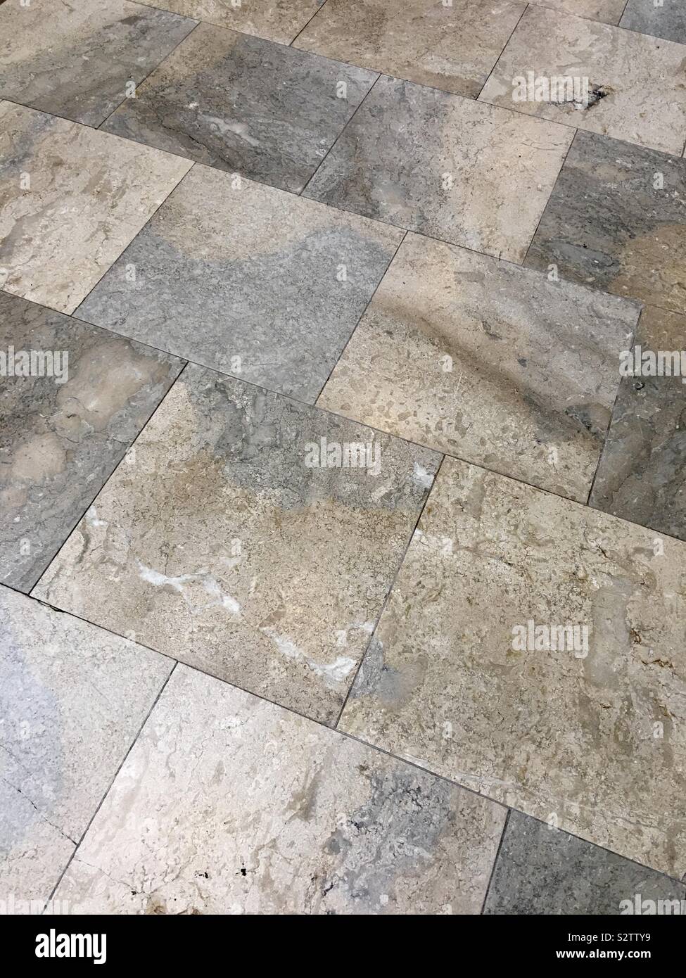 Detail of square marble floor tiles, suitable for use as background or ...