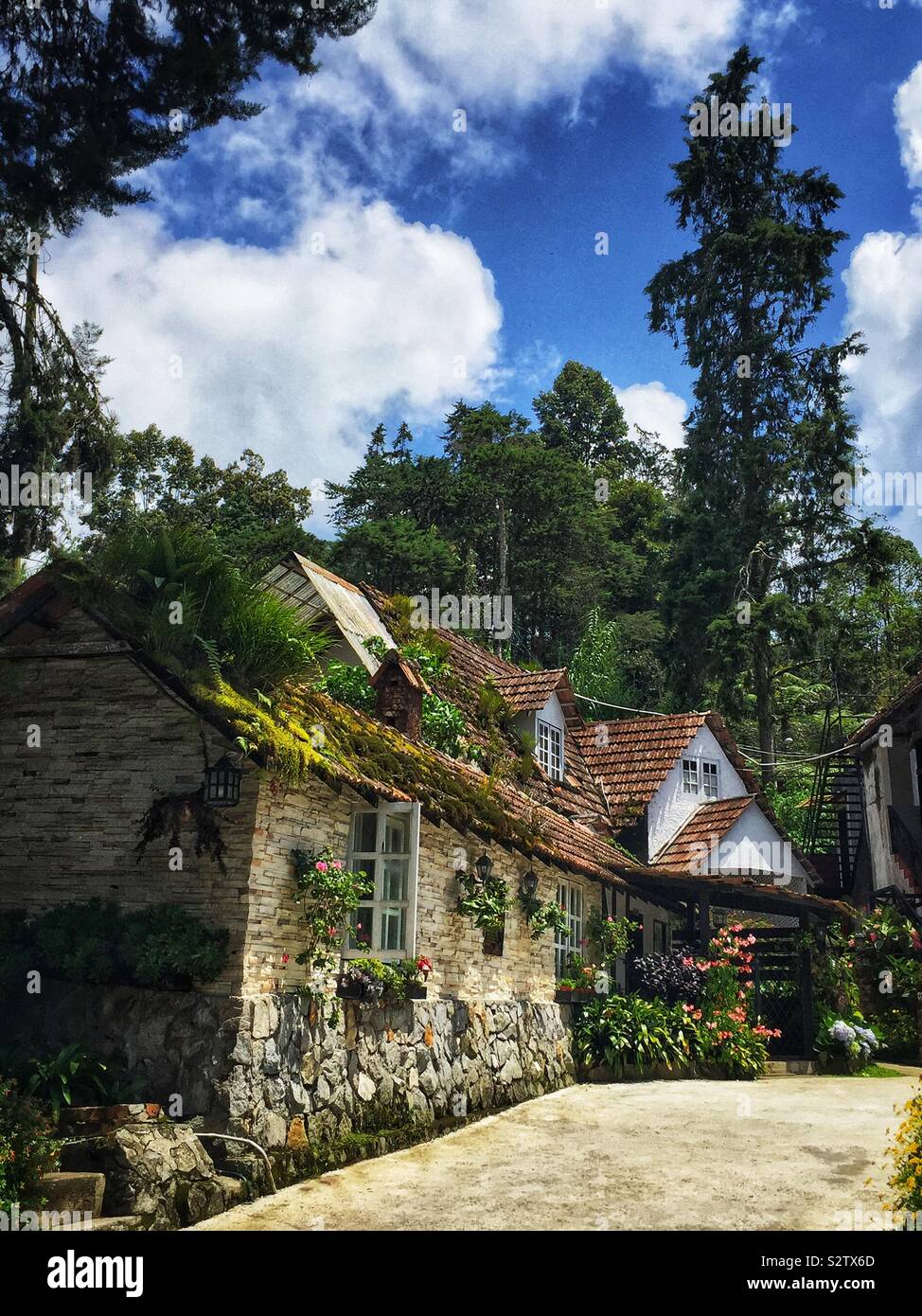 Cottages adjoining The Smokehouse, an English mock-Tudor style house ...