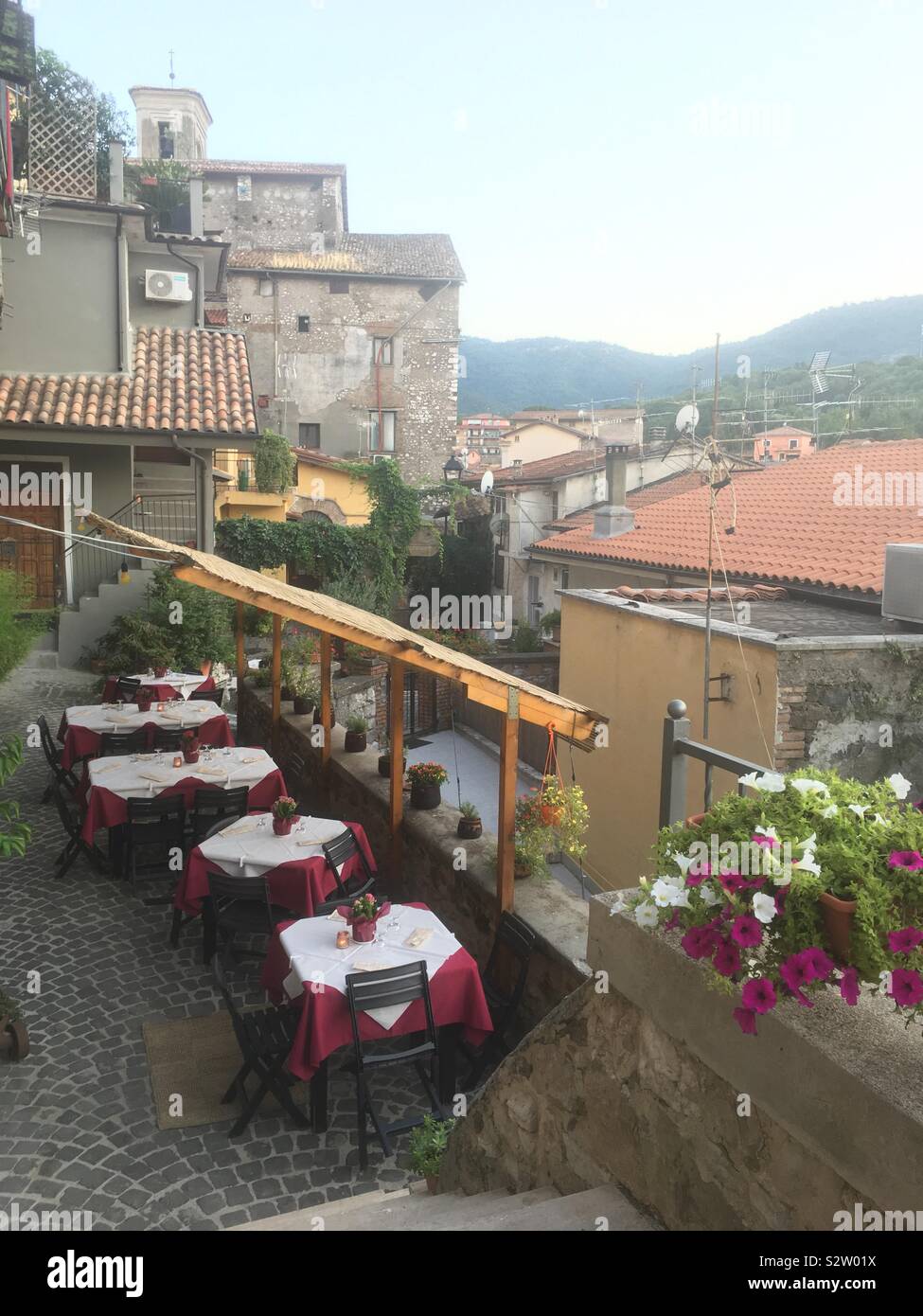 tables in the historic center Stock Photo - Alamy