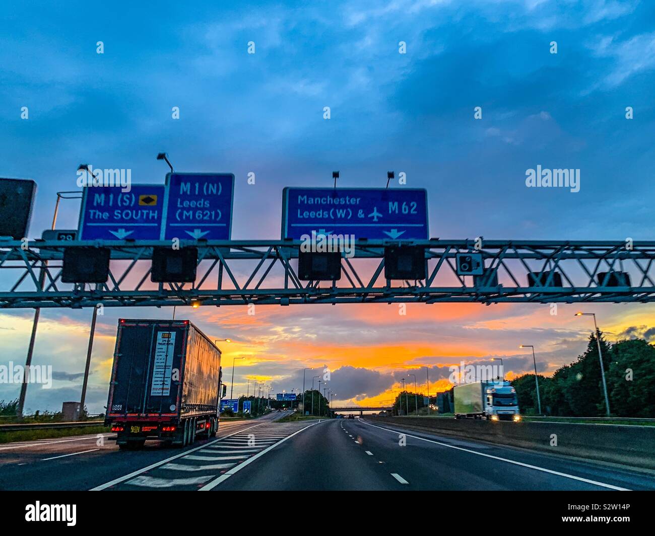 Sunset on M62 motorway Stock Photo - Alamy