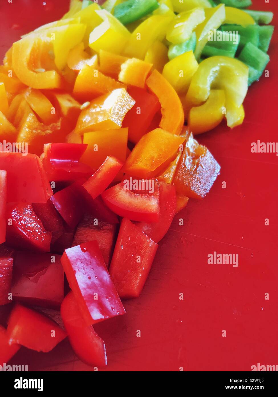 Closeup of freshly washed and chopped sweet bell peppers Stock Photo ...