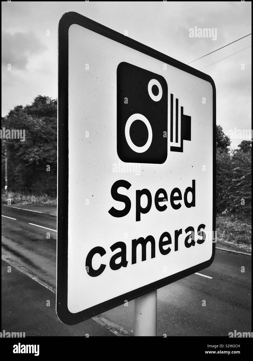 Road signage for race Black and White Stock Photos & Images - Alamy
