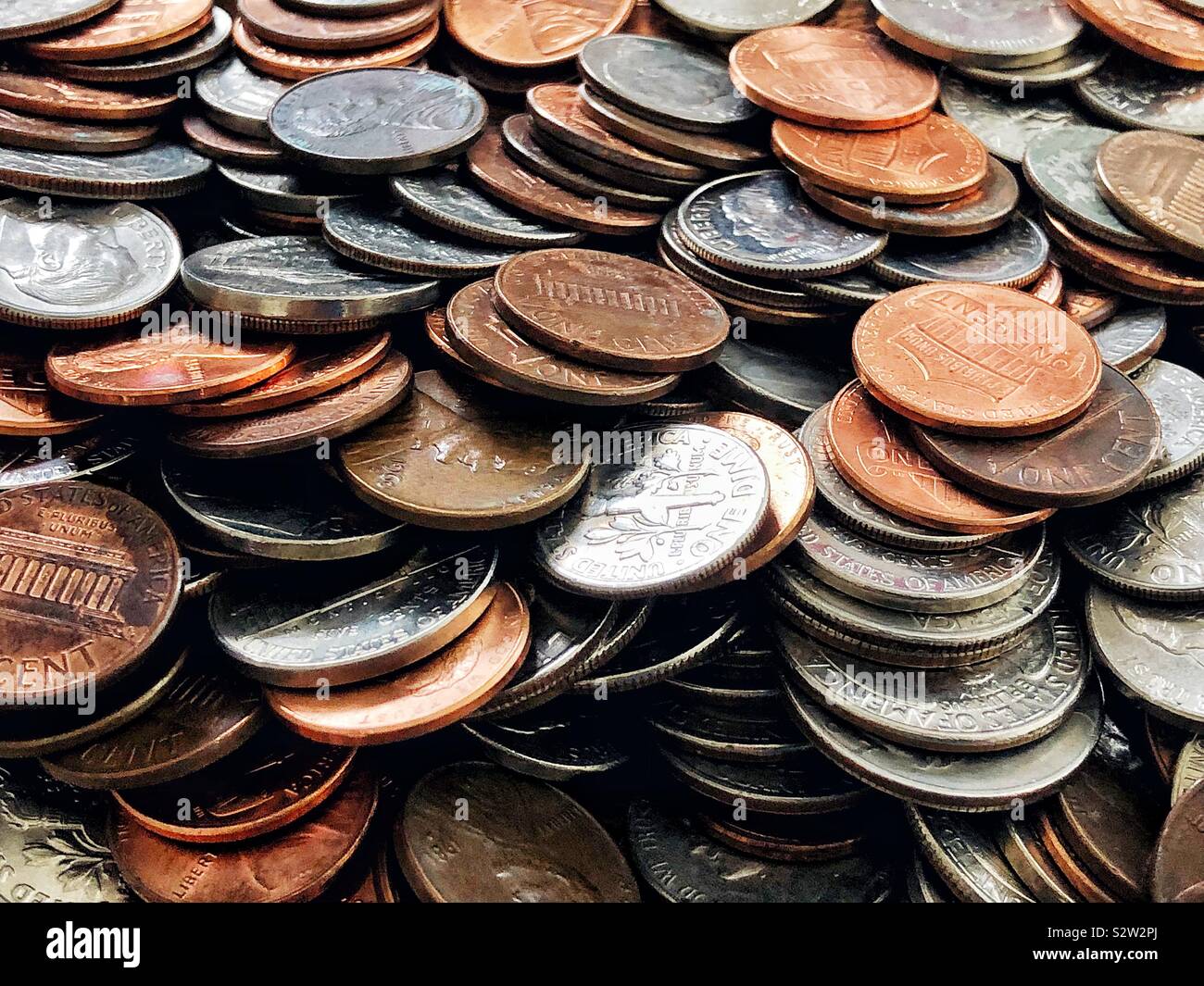 Pile of american coins Stock Photo - Alamy