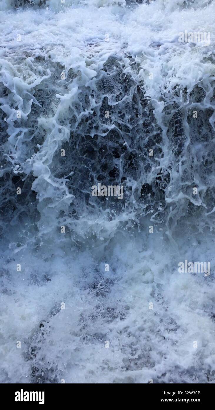Rushing flood water Stock Photo - Alamy