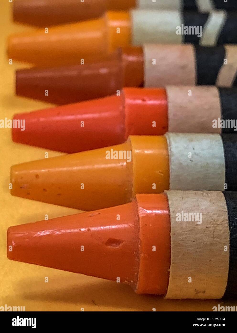 Close up view of orange tone crayon tips Stock Photo - Alamy