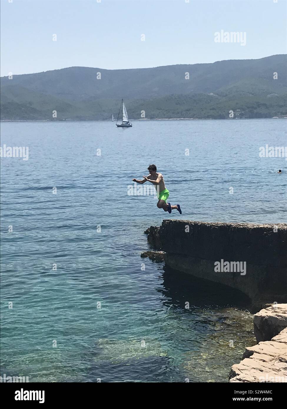 Jumping into sea croatia hi-res stock photography and images - Alamy