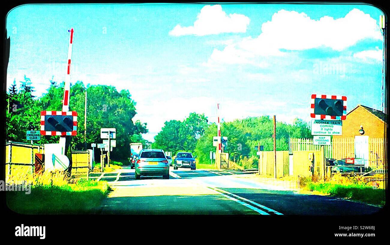 Level crossing road barriers hi-res stock photography and images - Alamy