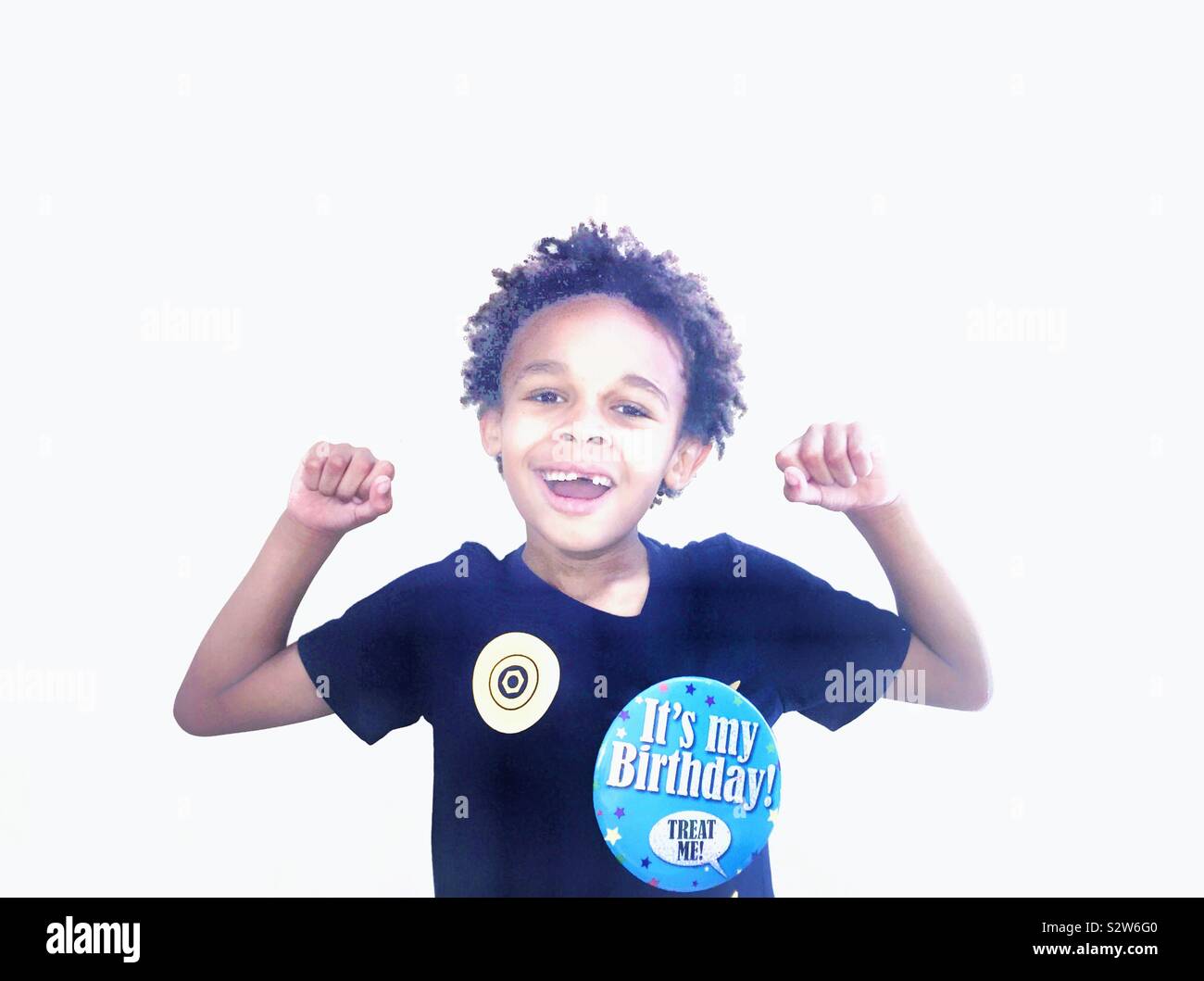 A young boy showing off his birthday badge Stock Photo - Alamy