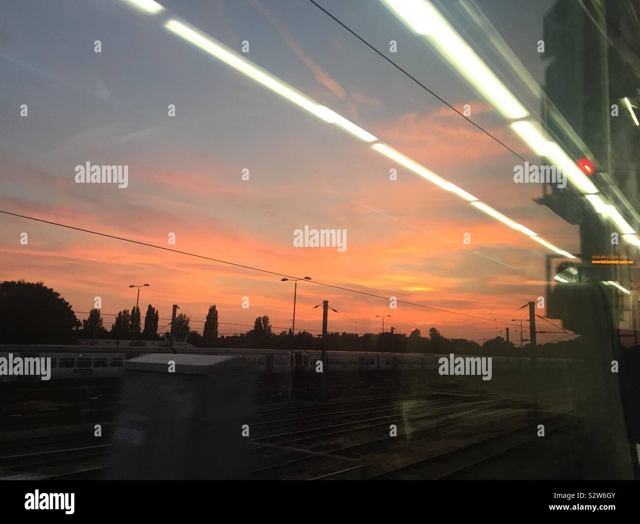 Train window at sunset hi-res stock photography and images - Alamy