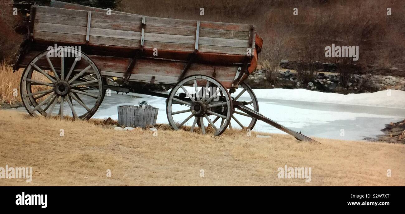 Old historic wooden wheeled wagon Stock Photo - Alamy