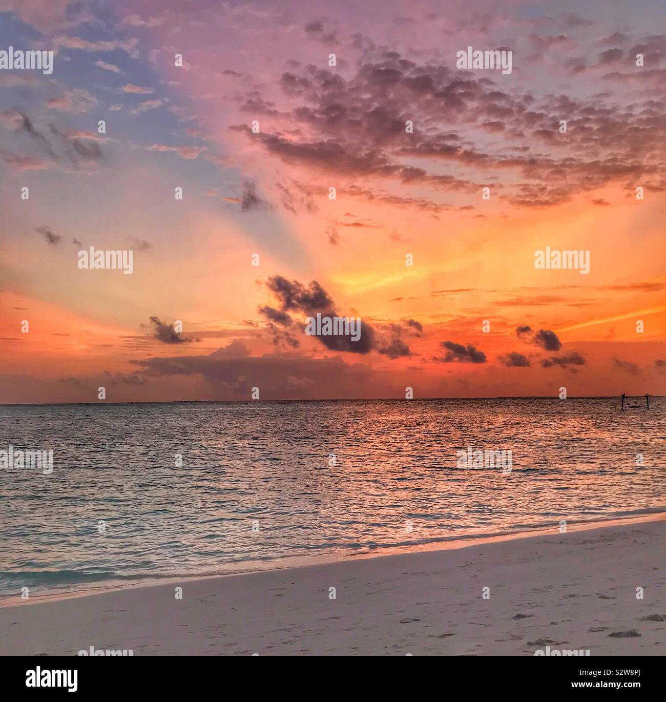 Sunset in the Maldives Stock Photo - Alamy