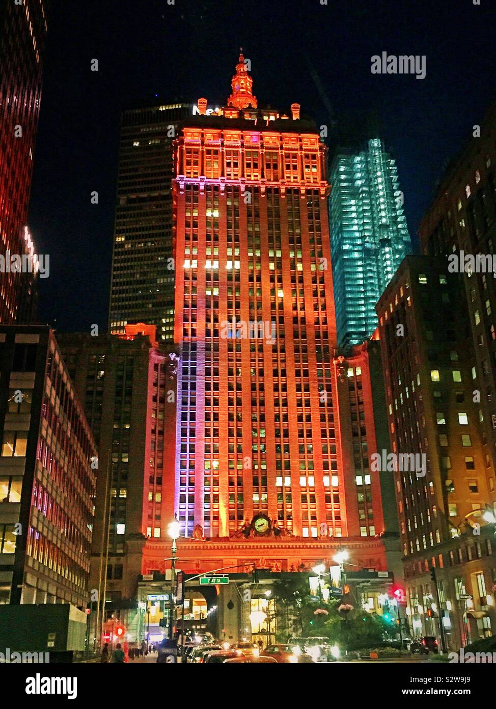 The Helmsley building on Park Avenue is brightly lit at night, NYC, USA ...