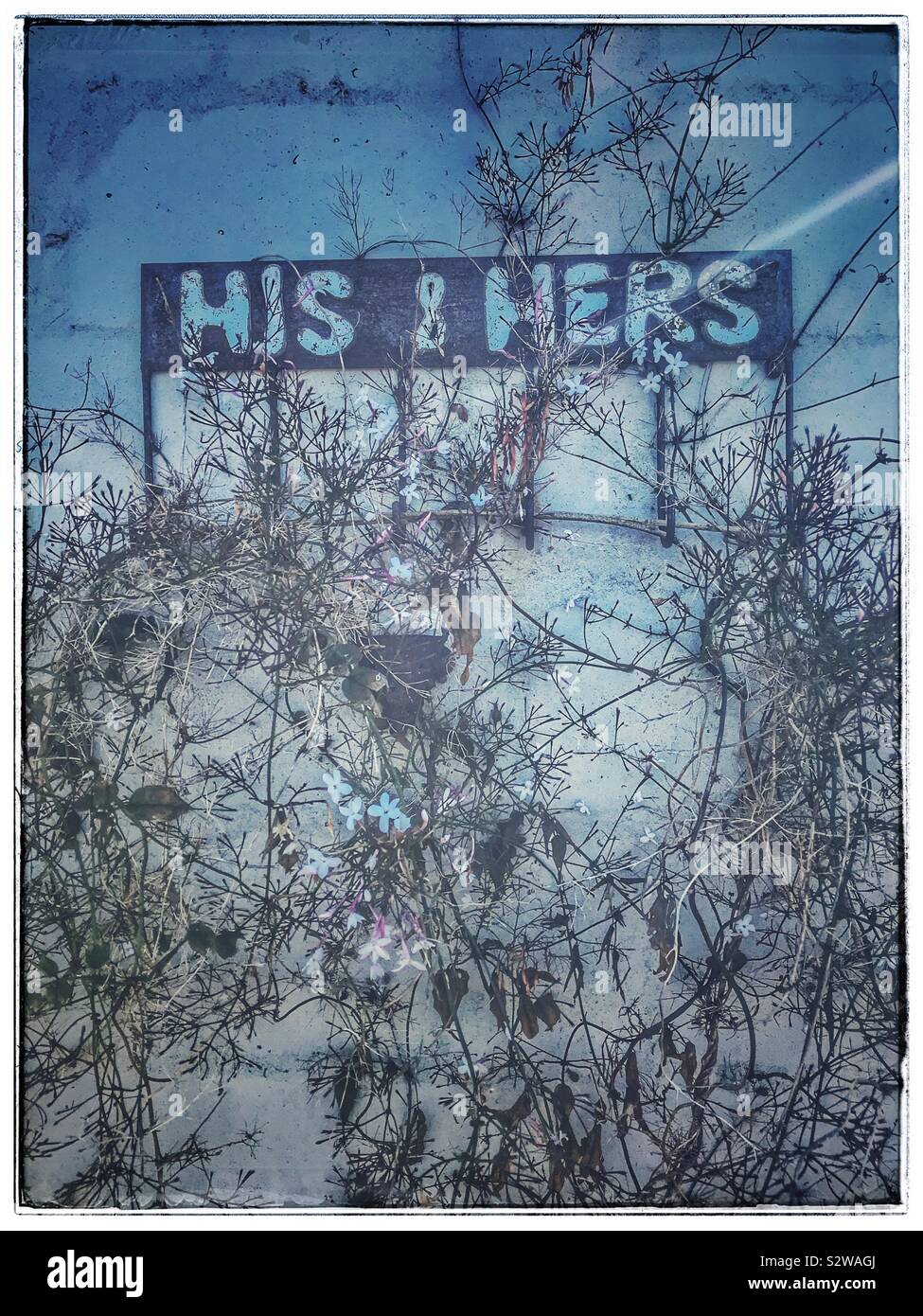 “His& Hers” sign outside restrooms Stock Photo - Alamy