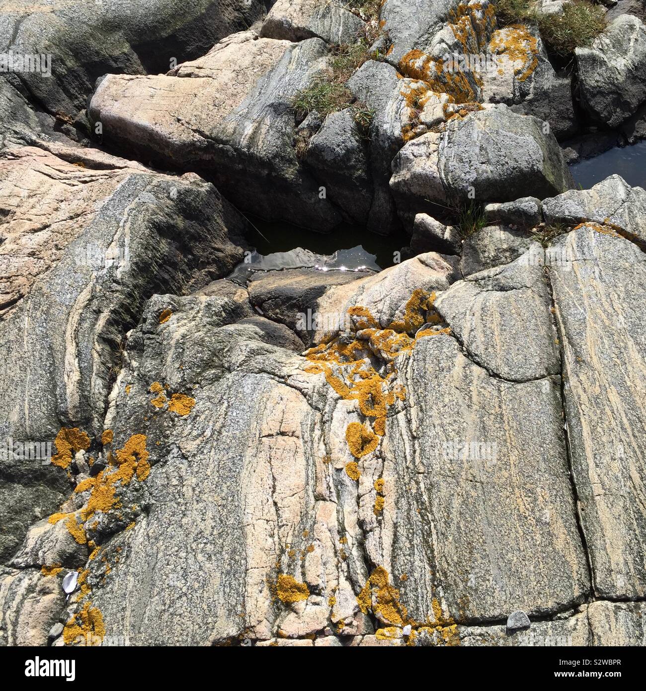Cliff formation with moss Stock Photo - Alamy