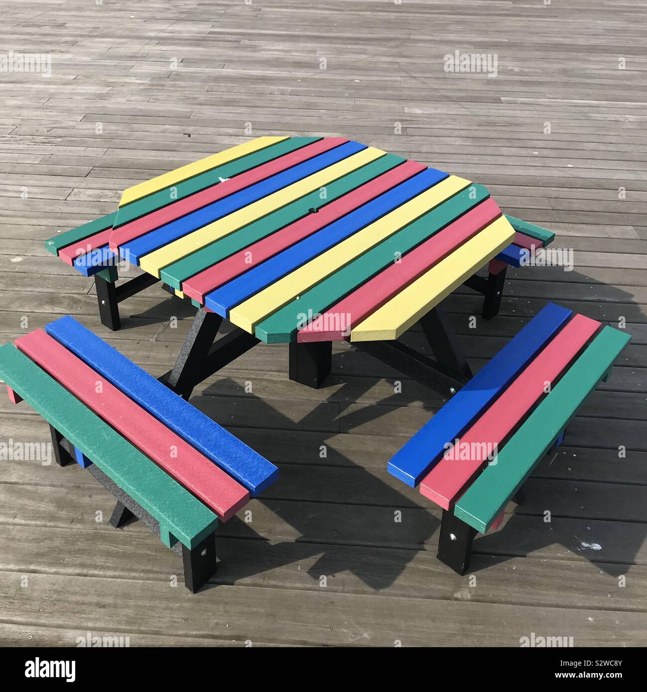 Coloured bench table Stock Photo - Alamy