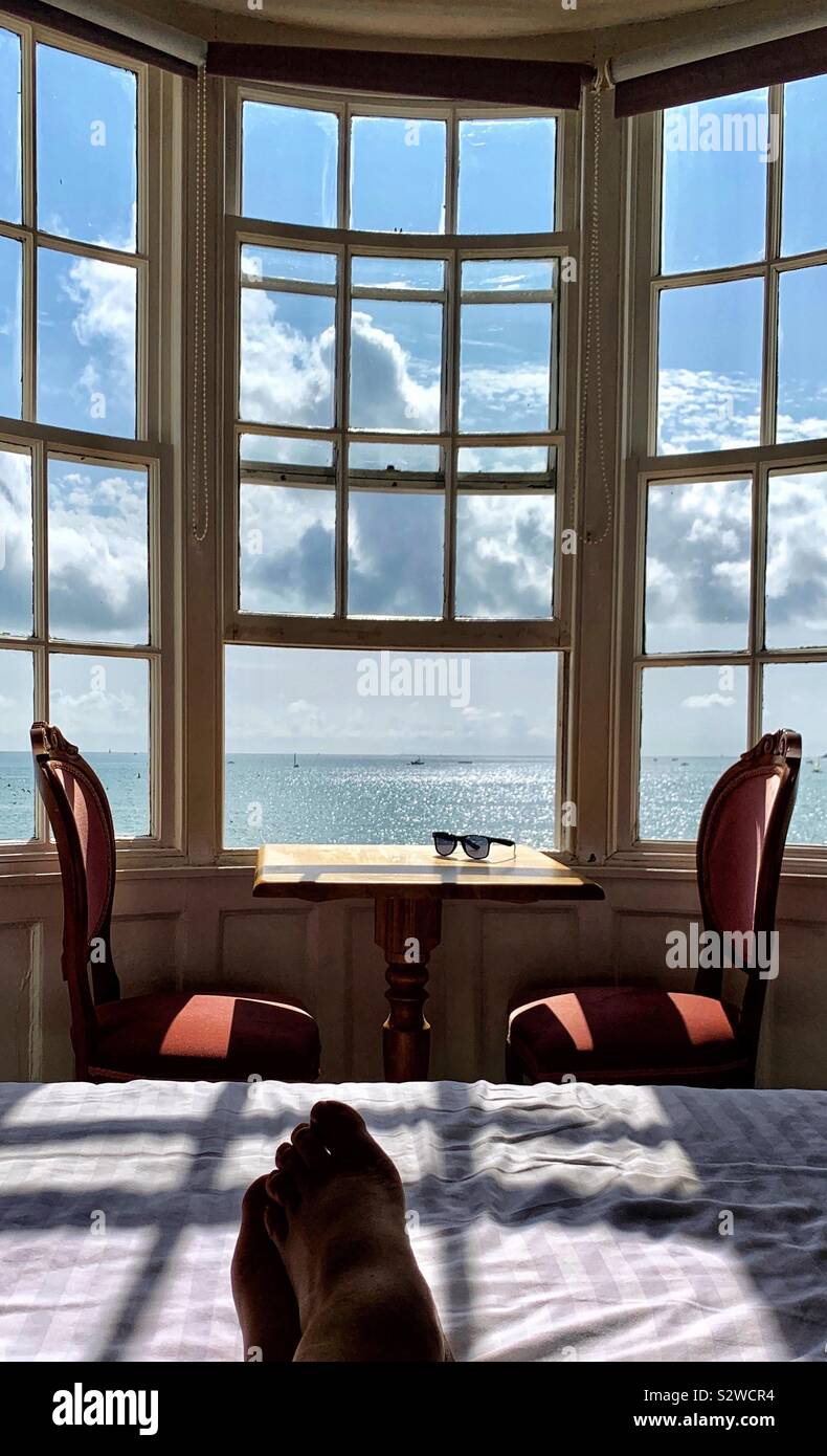 Sea view from wooden sashed bay window Stock Photo - Alamy