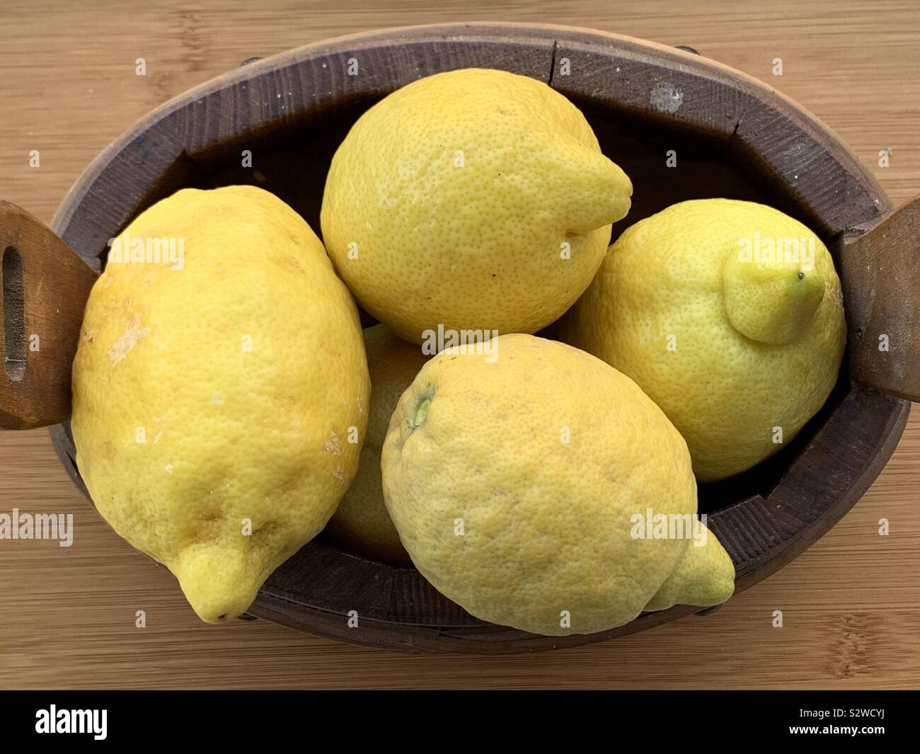 Typical lemons from Sorrento, Campania region, Italy, in a wooden ...