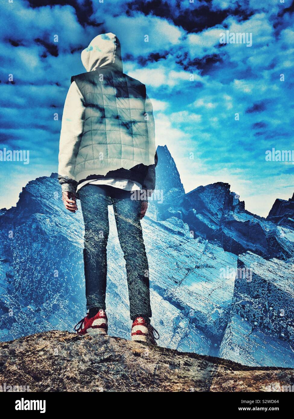 Abstract image of a male teenager and a rock face Stock Photo - Alamy