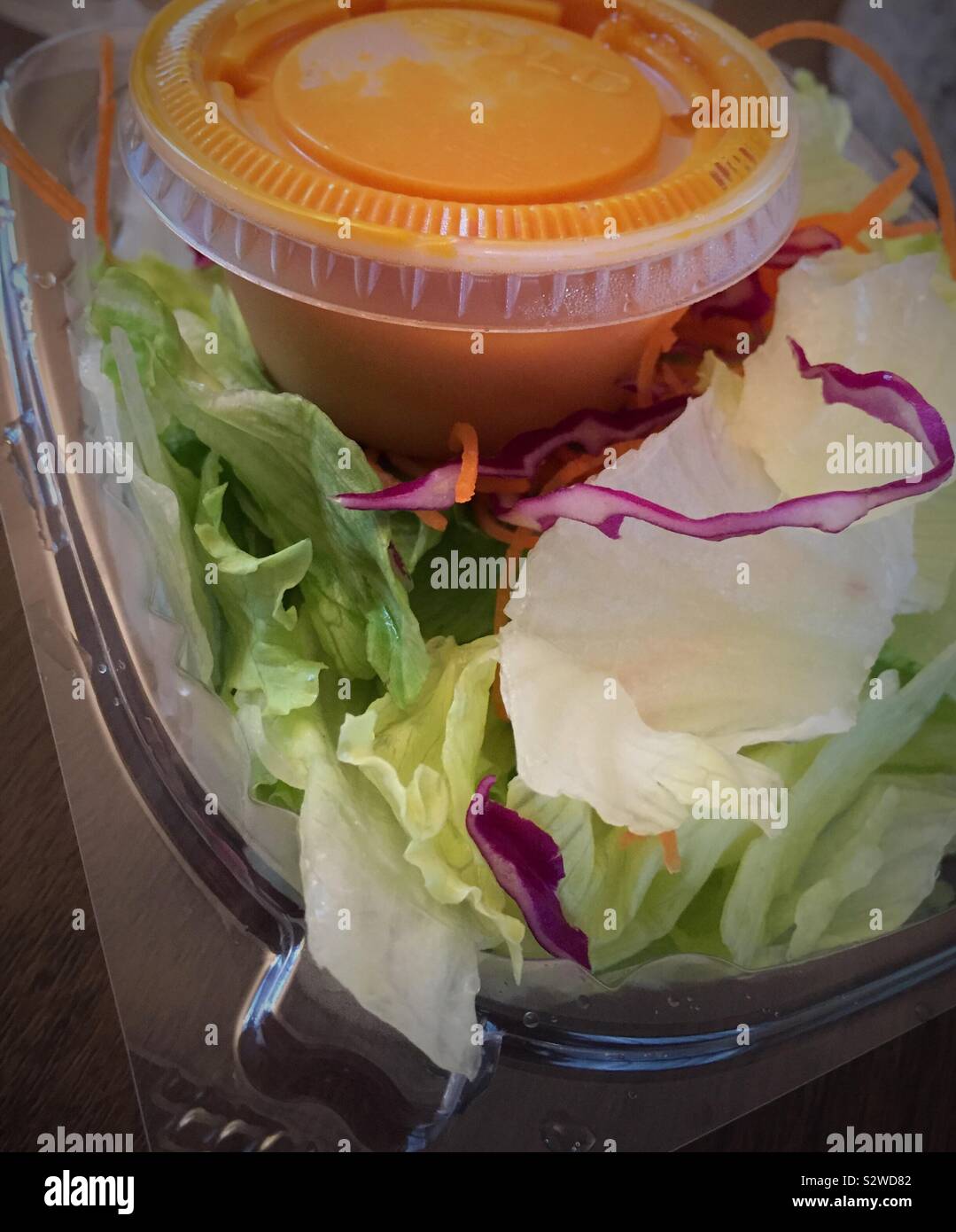 Delivery or take out plastic containers of lettuce and dressing, USA ...