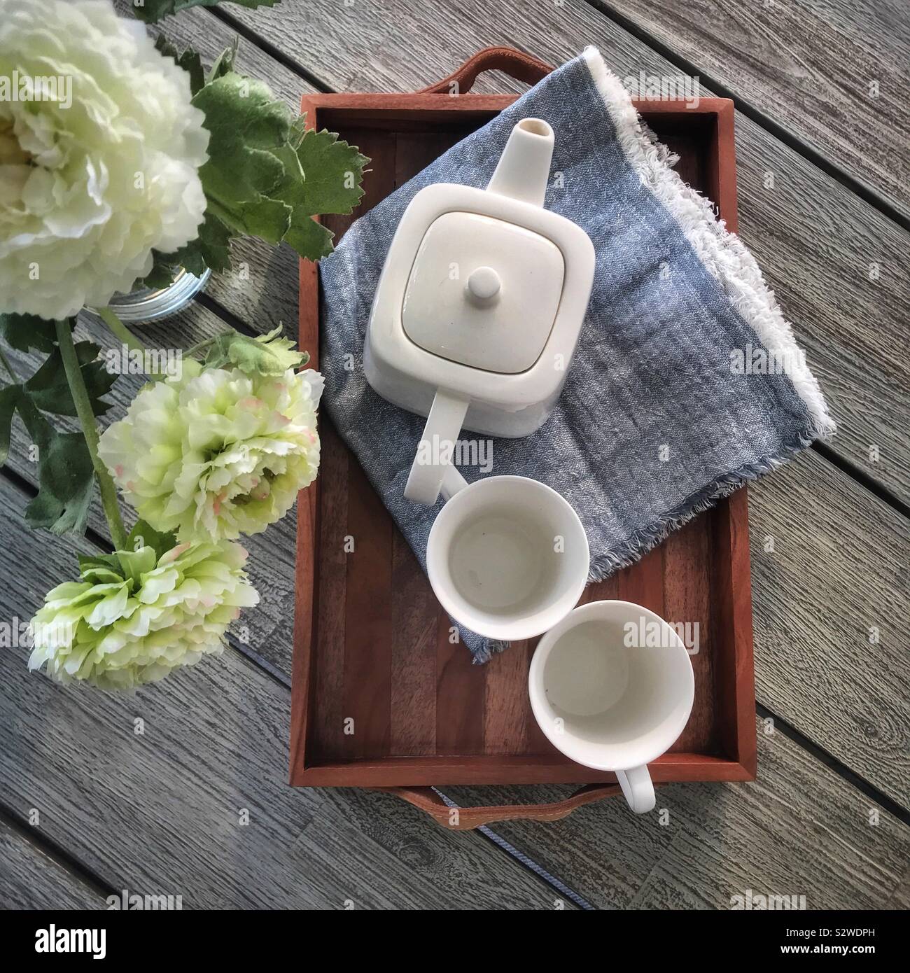 Teapot with two mugs Stock Photo - Alamy