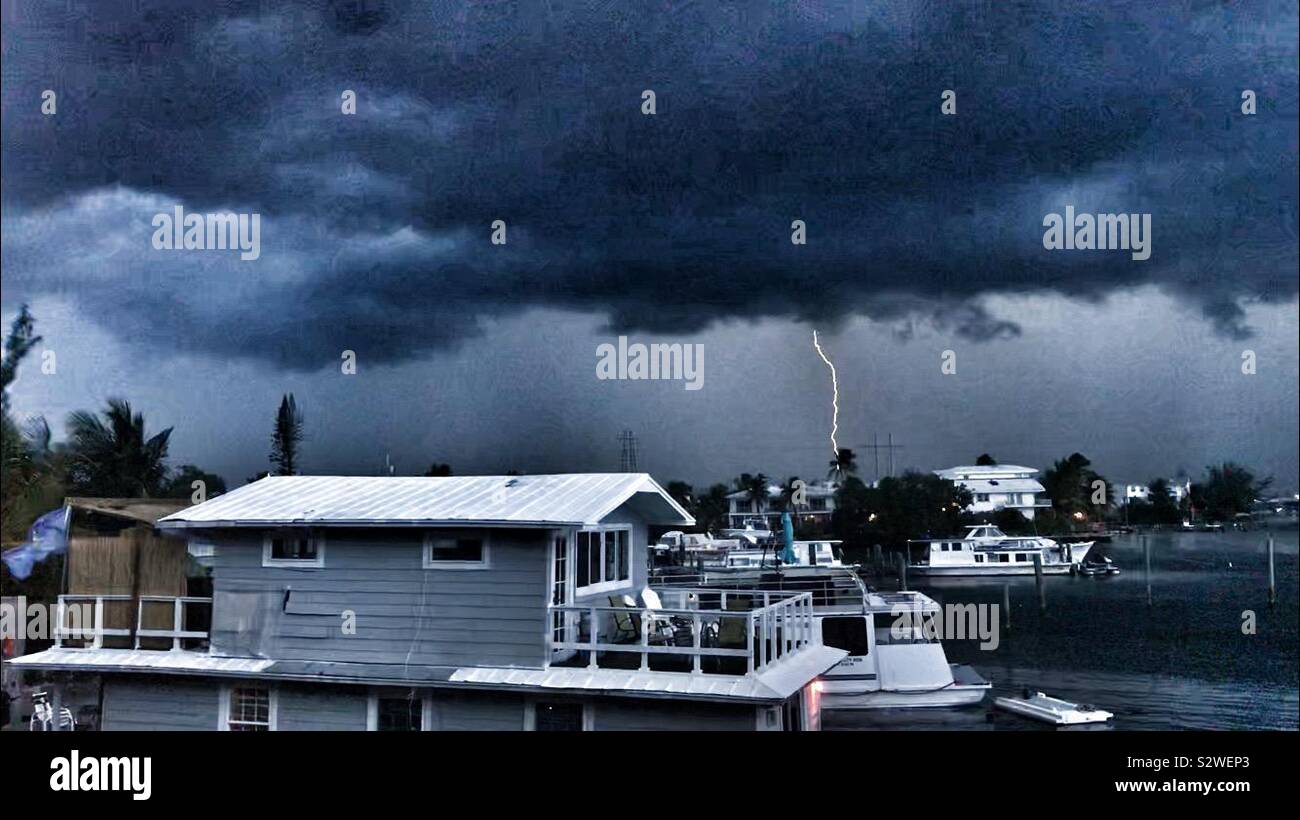 Key west storm over houseboats Stock Photo - Alamy