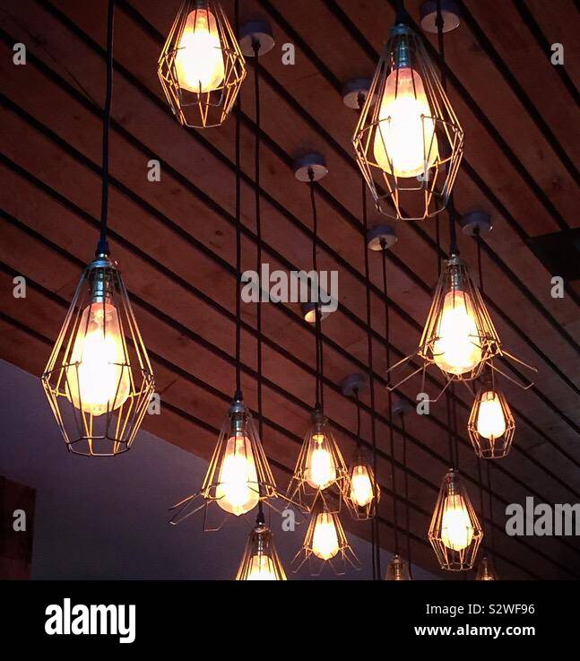 Hanging lightbulbs hi-res stock photography and images - Alamy