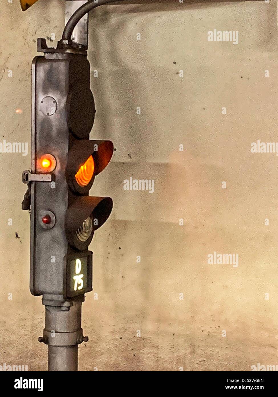 Railroad traffic light glowing yellow in an underground subway Stock ...