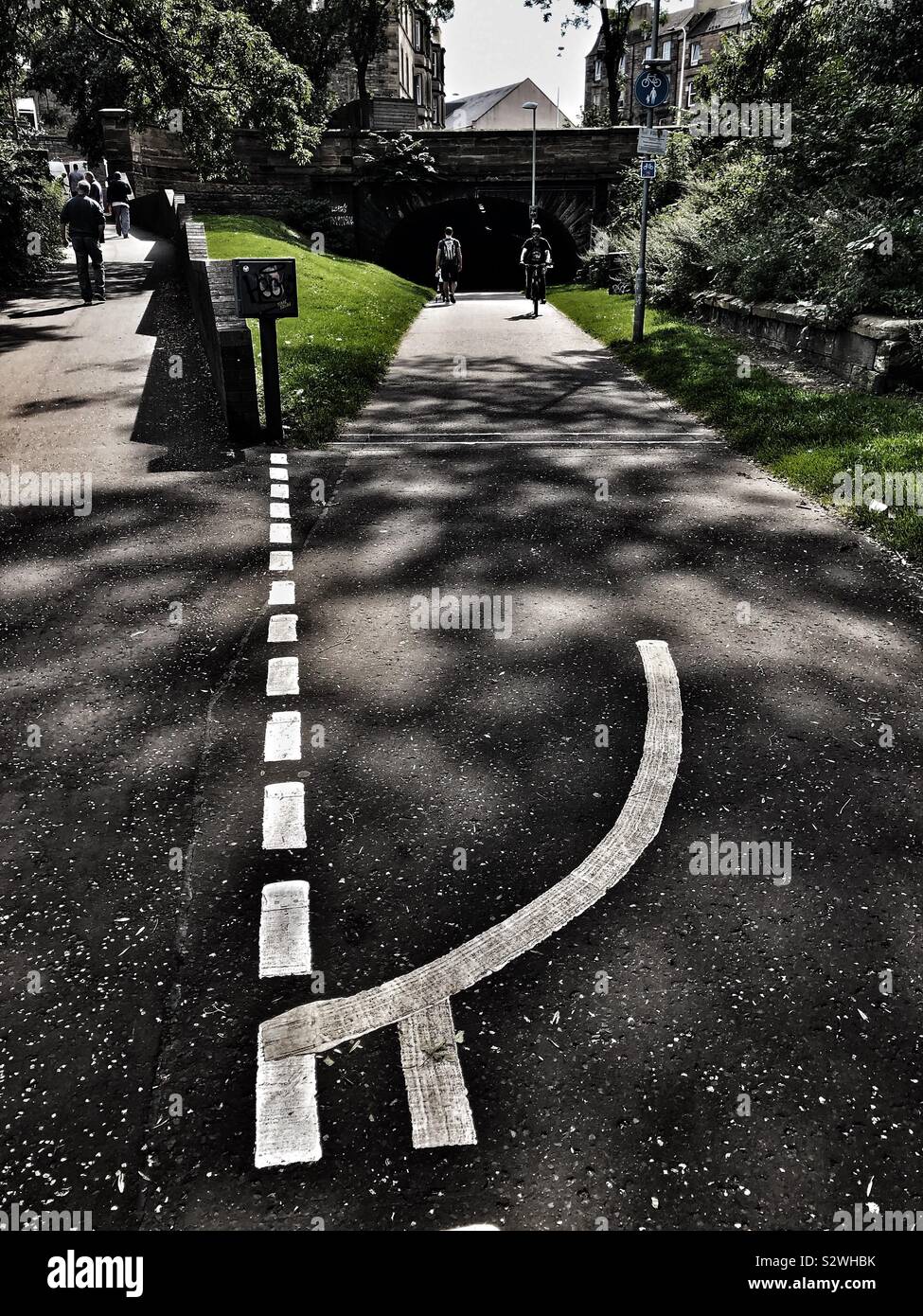 Junction on pedestrian walkway and cycle path Stock Photo - Alamy