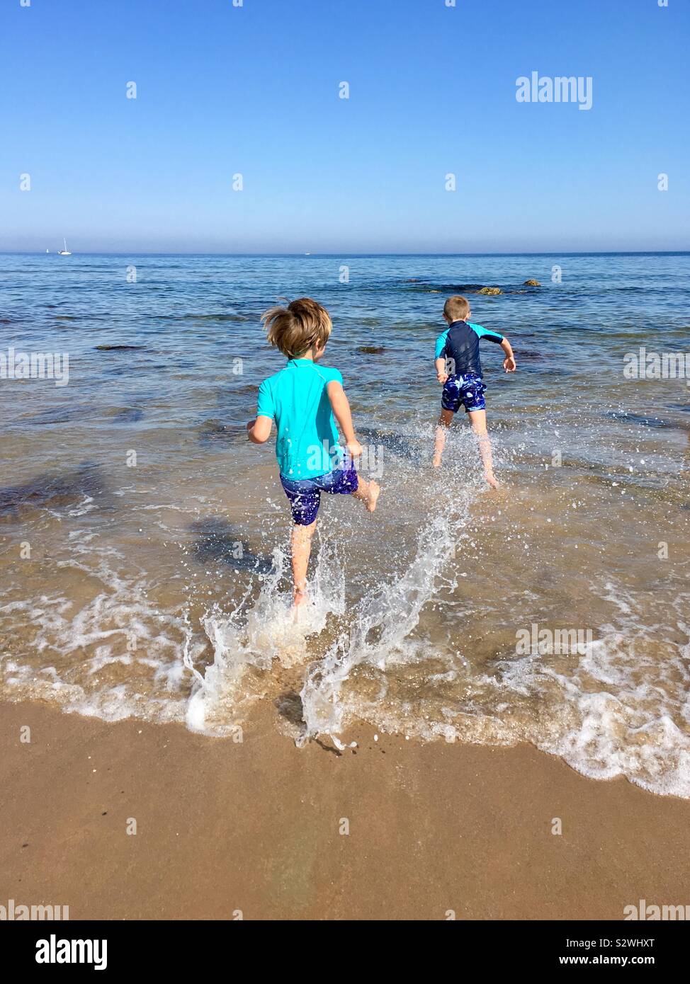 Boys in sea hi-res stock photography and images - Alamy