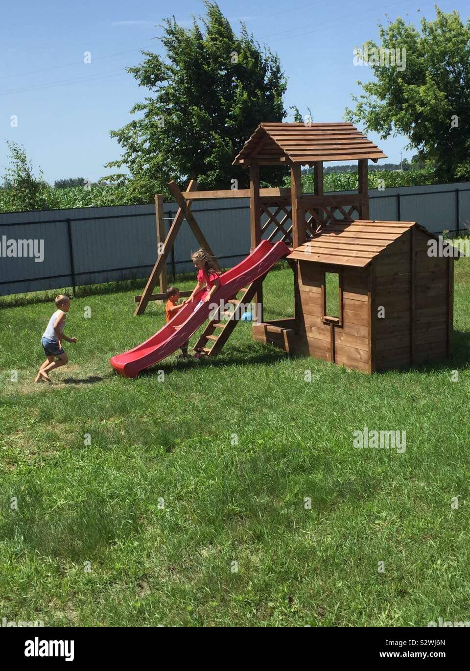 Children playing on playground Stock Photo - Alamy