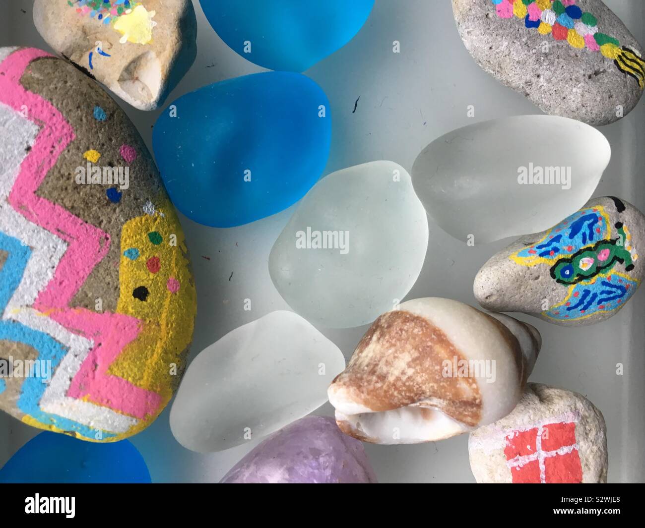 Creative painted rock display Stock Photo - Alamy