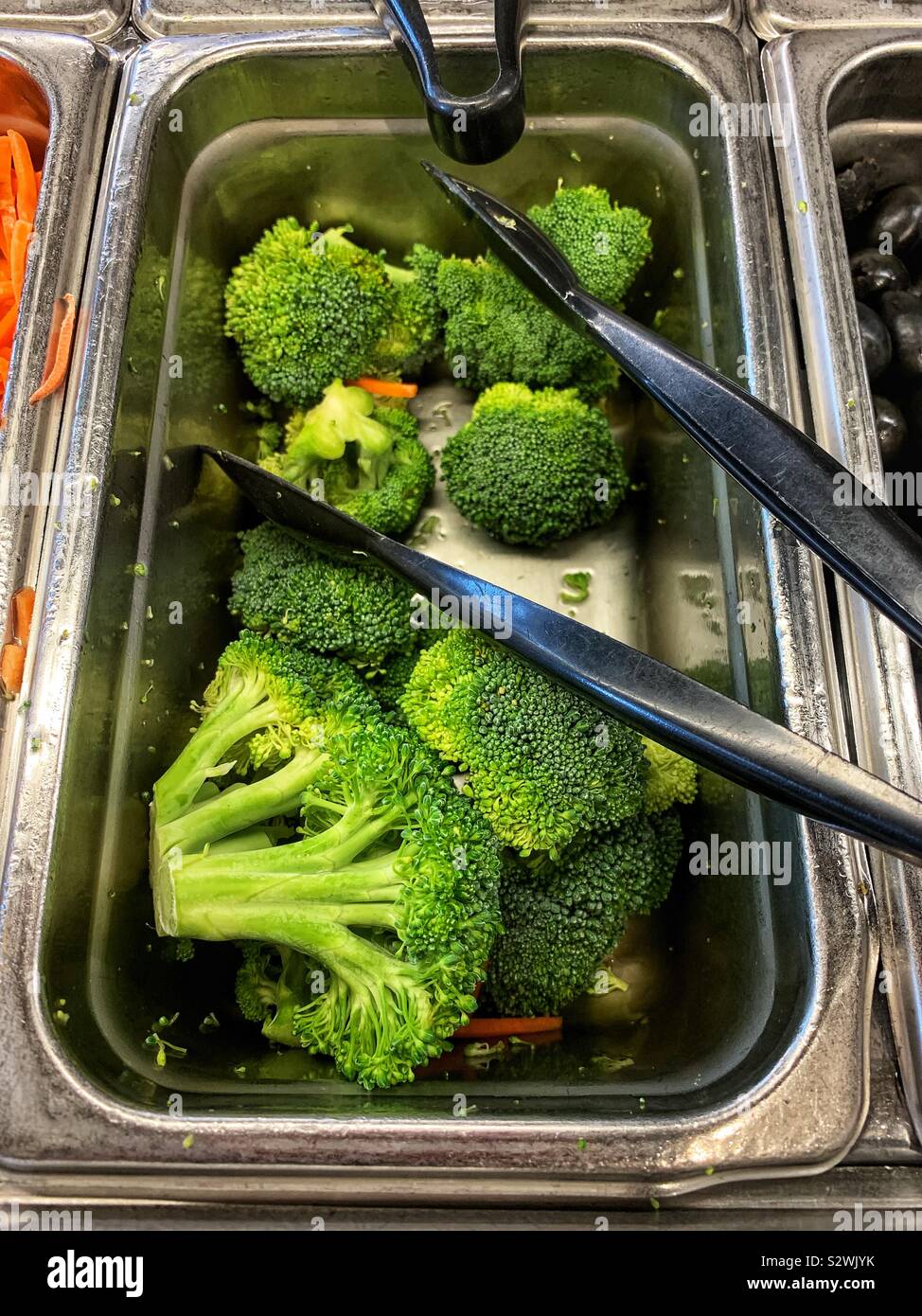 Bright green broccoli served buffet style Stock Photo - Alamy