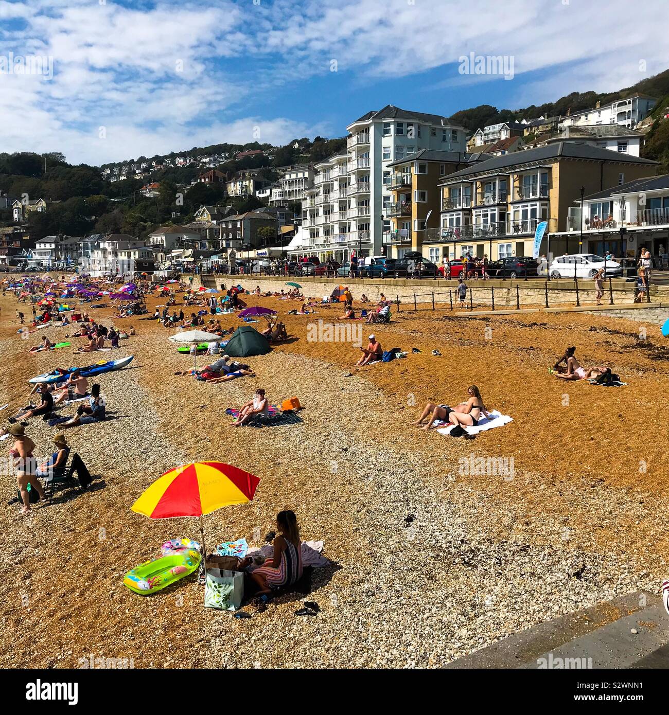 Sun worshippers on beach hi-res stock photography and images - Alamy