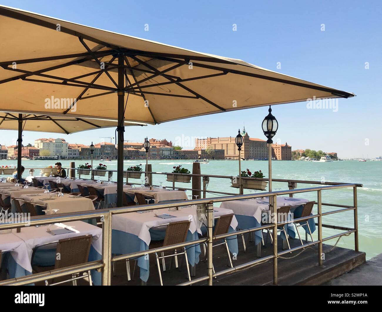 Restaurant on Venice waterfront, Italy, Europe Stock Photo - Alamy
