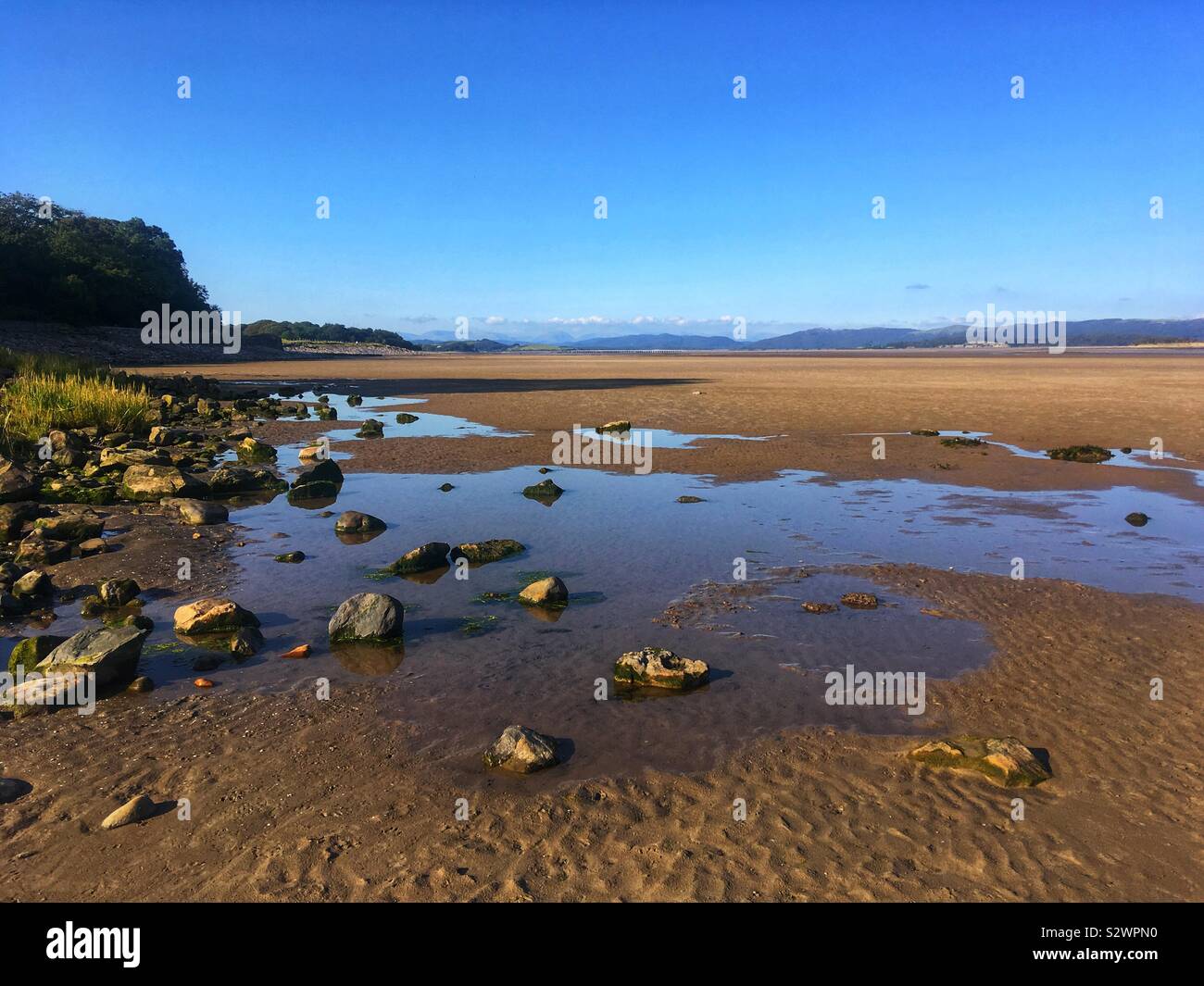 Beach cliffs rocks sand hi-res stock photography and images - Alamy