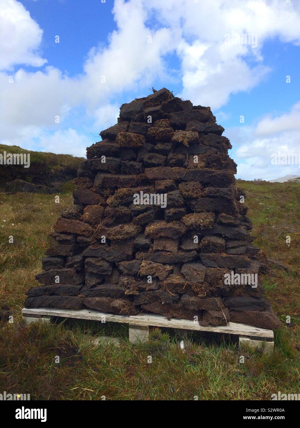 Hand cut peat stack on the Isle of Harris, Scotland Stock Photo - Alamy