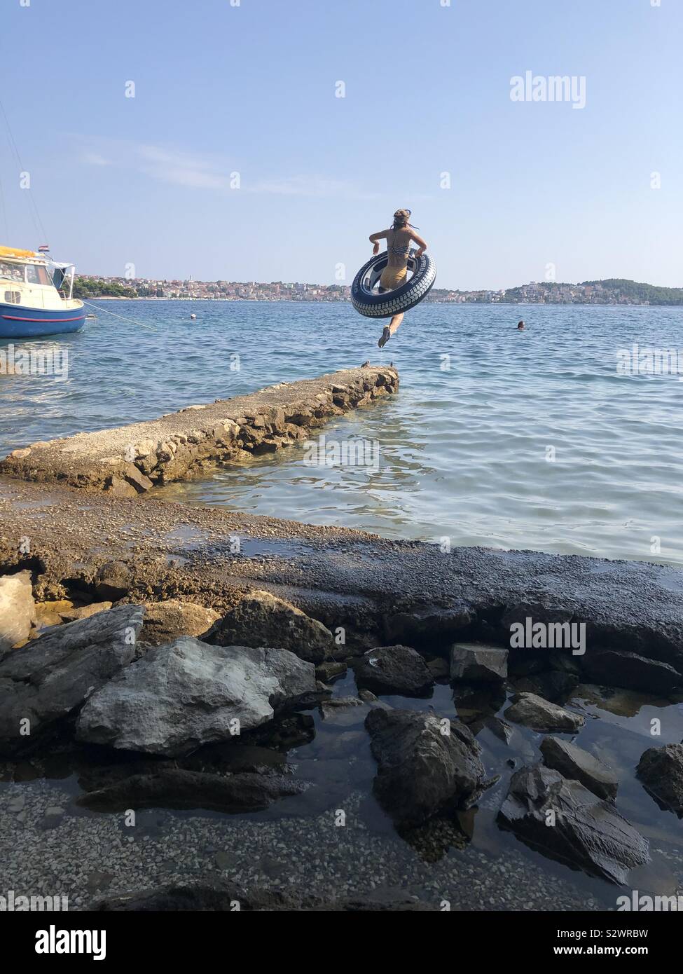 Leaping into water hi-res stock photography and images - Alamy