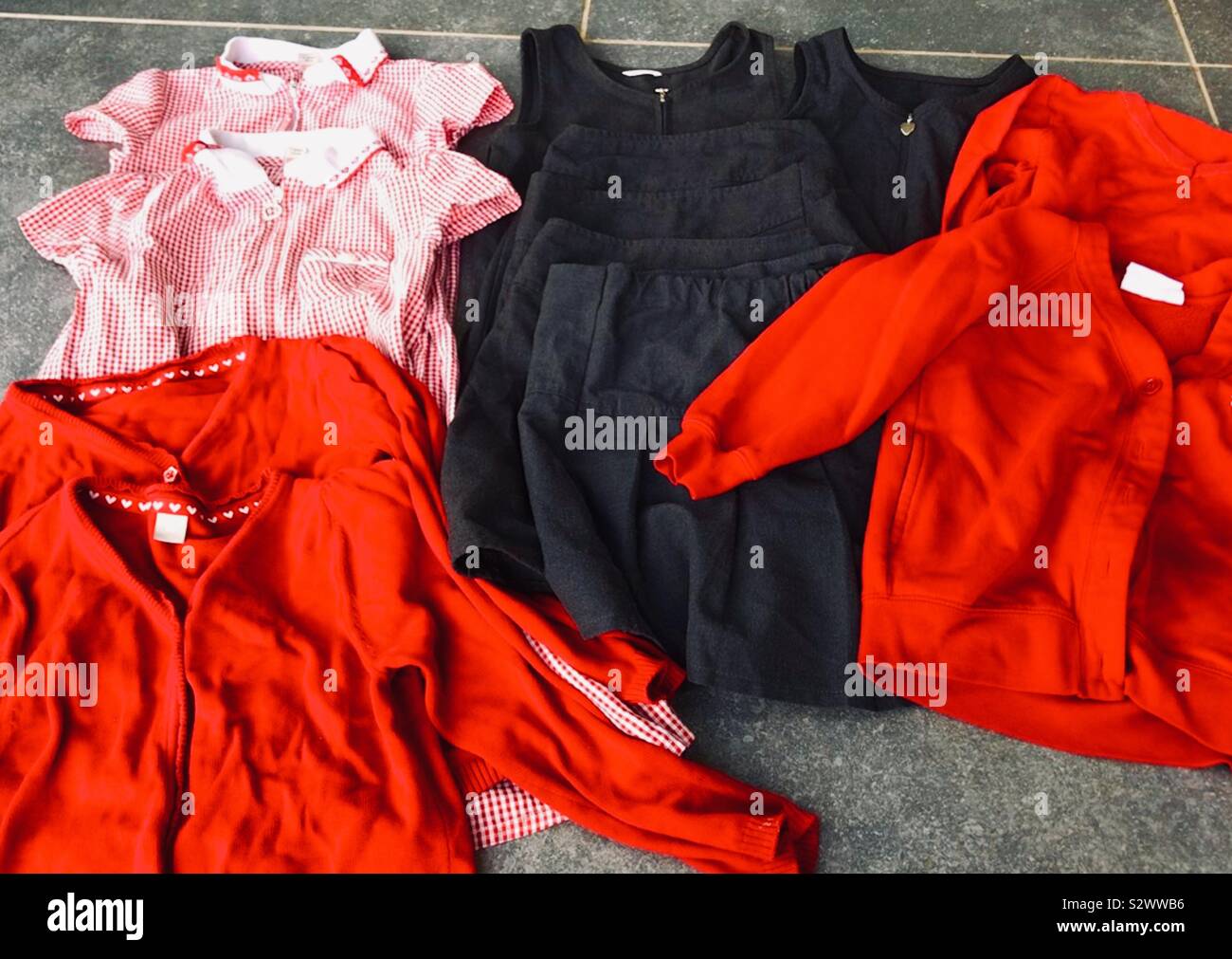 Red school uniform hi-res stock photography and images - Alamy
