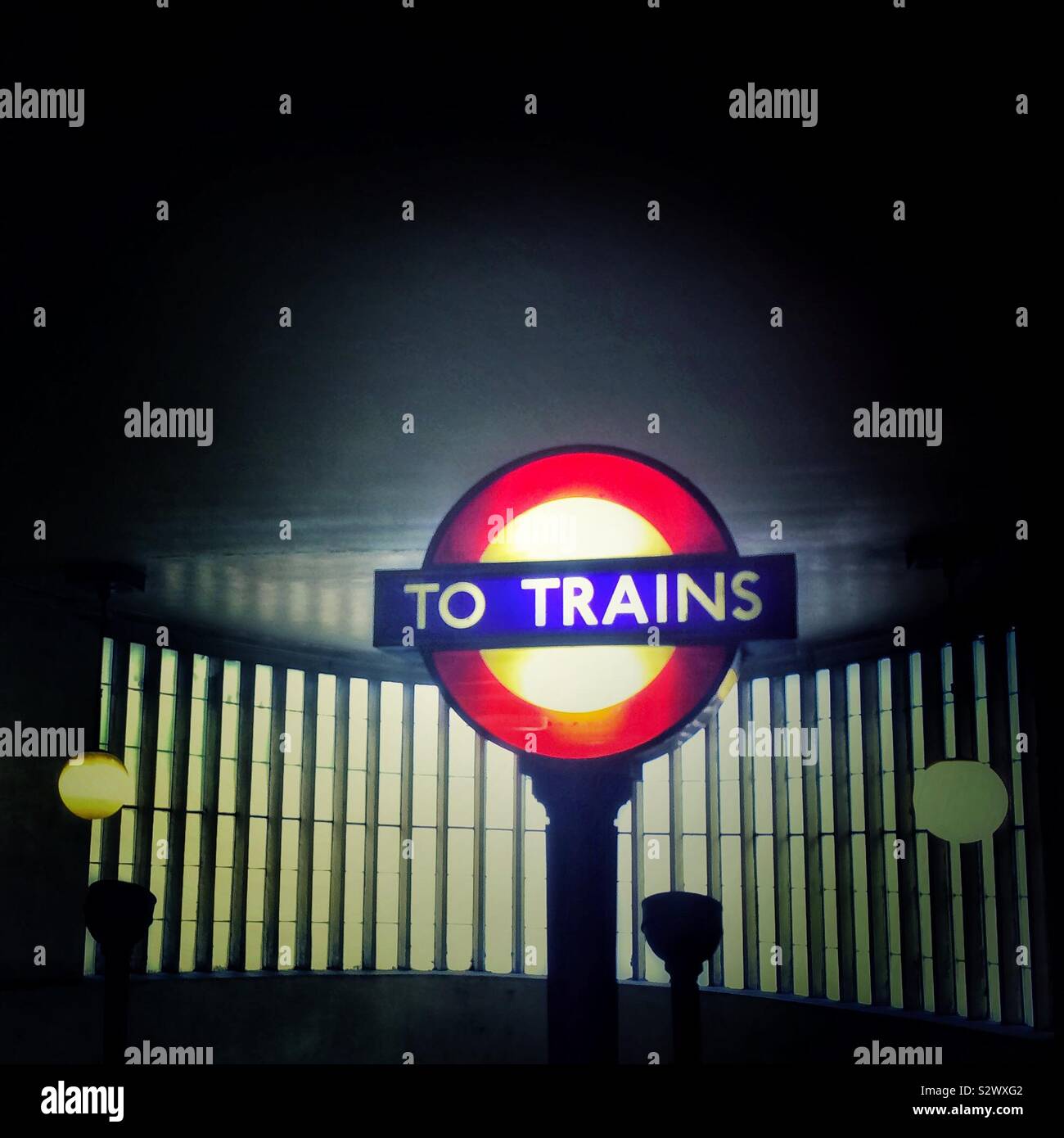 To train sign in London station Stock Photo - Alamy