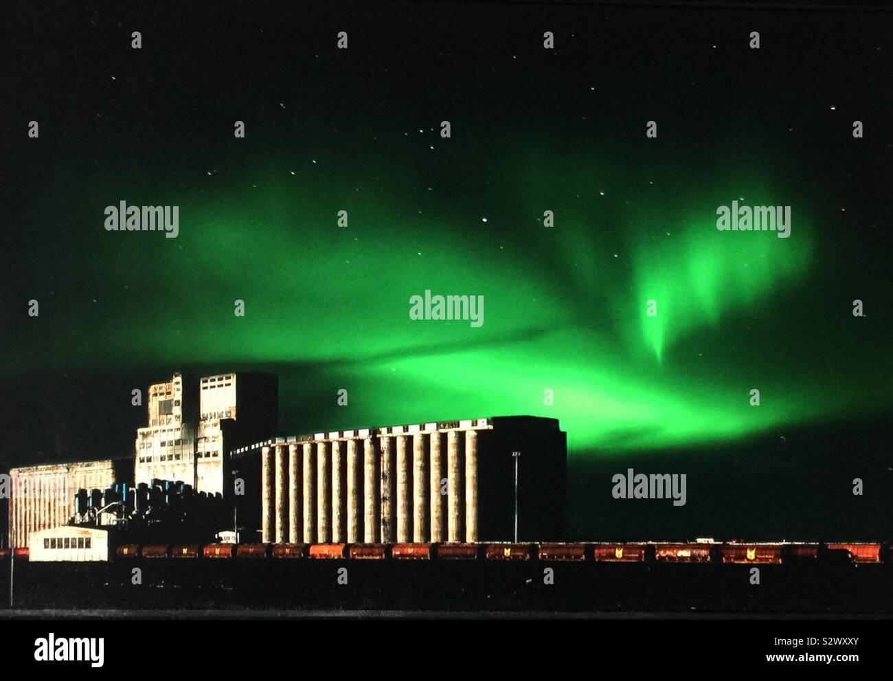 Grain shipping terminal on the Hudson Bay and the northern lights at ...
