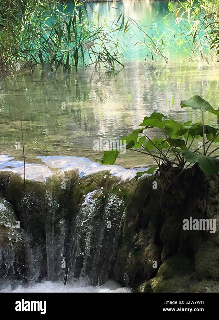 Lake and waterfall Stock Photo - Alamy